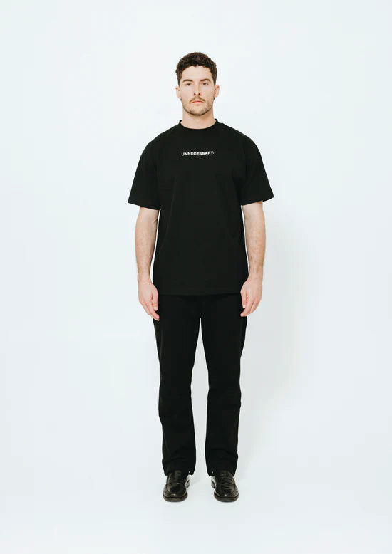 UNNECESSARY Logo Tee Black – Cabinet Noir